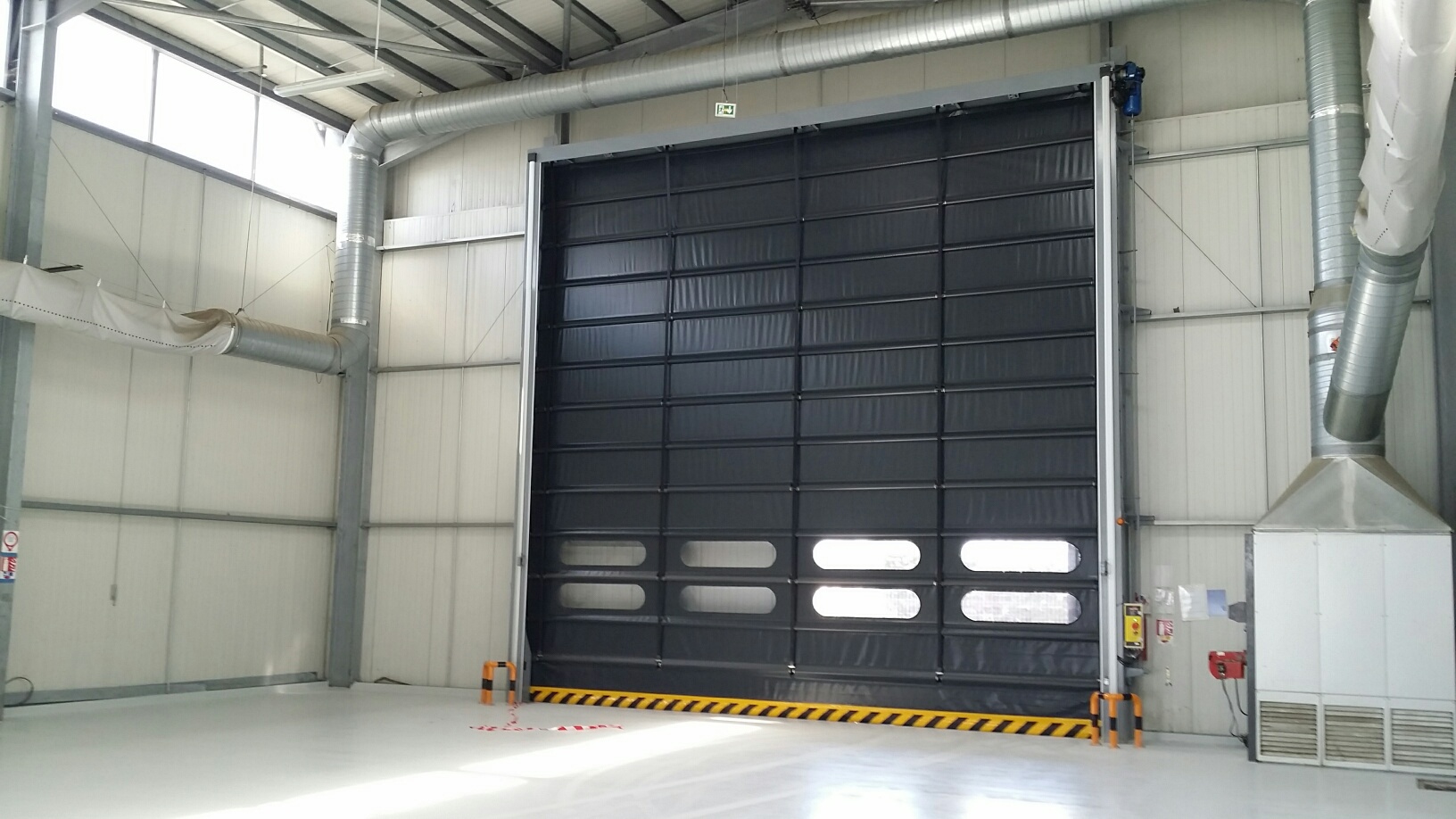 Instant Pass High-Speed Fold-Up door | Pearson Industrial Doors